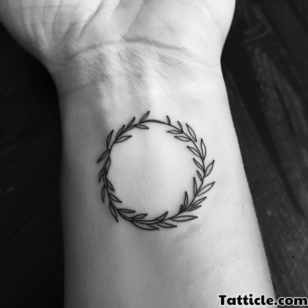 Unraveling the Laurel Wreath Tattoo Meaning: Embodying Resilience and Accomplishment - Tatticle
